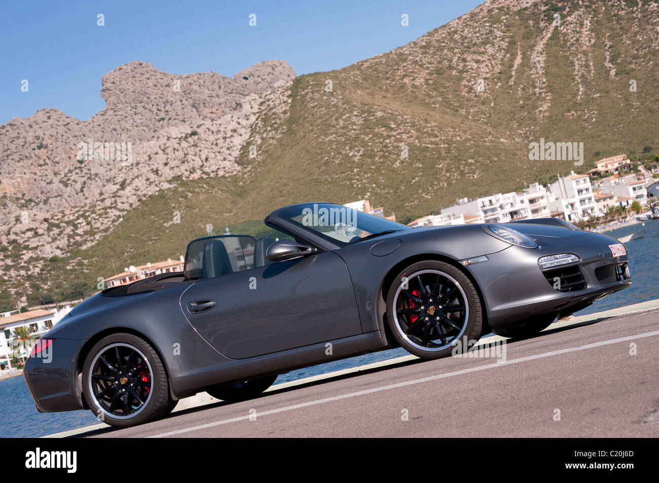 Silver Porsche 911 Carrera Cabriolet sports car Stock Photo - Alamy