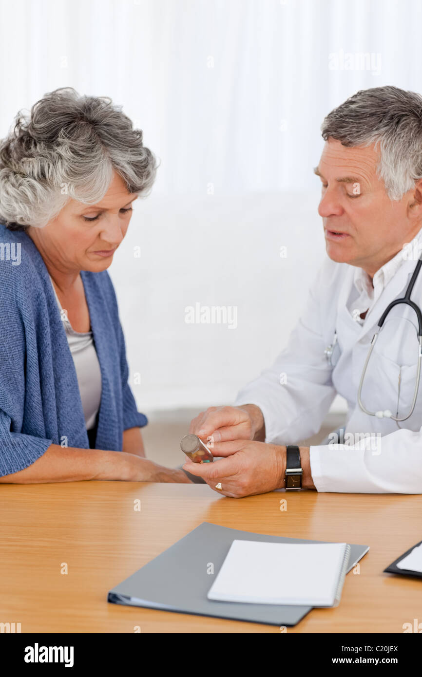 A senior doctor with his patient in his office Stock Photo - Alamy
