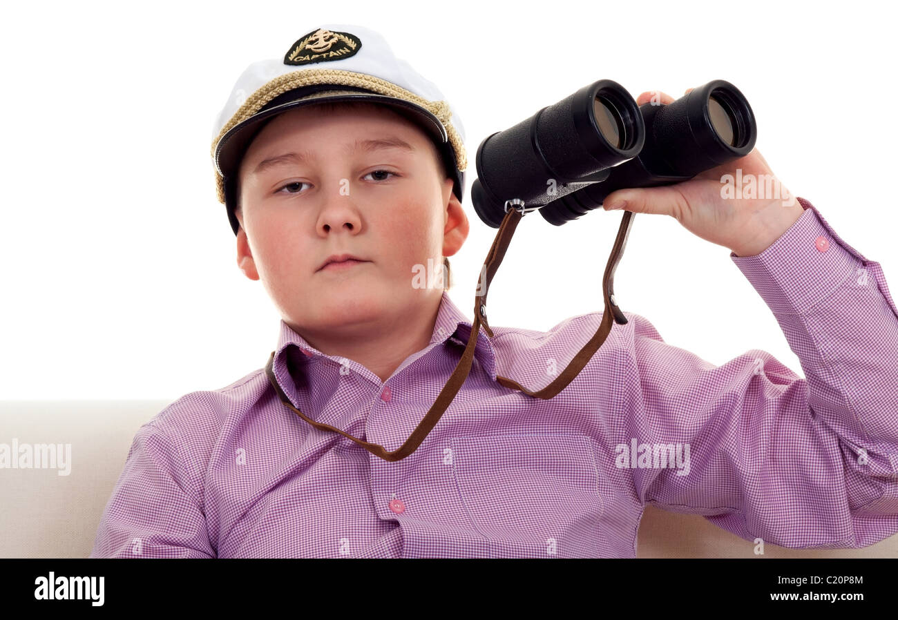 Strict boy with glasses and a cap Captain Stock Photo - Alamy