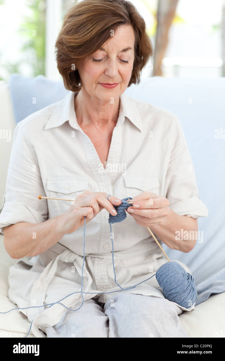Woman knitting at home Stock Photo - Alamy