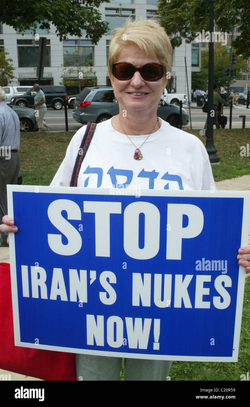 Activists hold posters during an anti-nukes rally Protesters ...