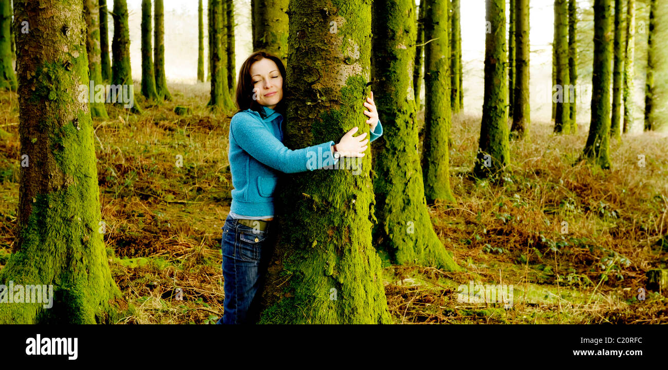 Tree hugging hippy hi-res stock photography and images - Alamy