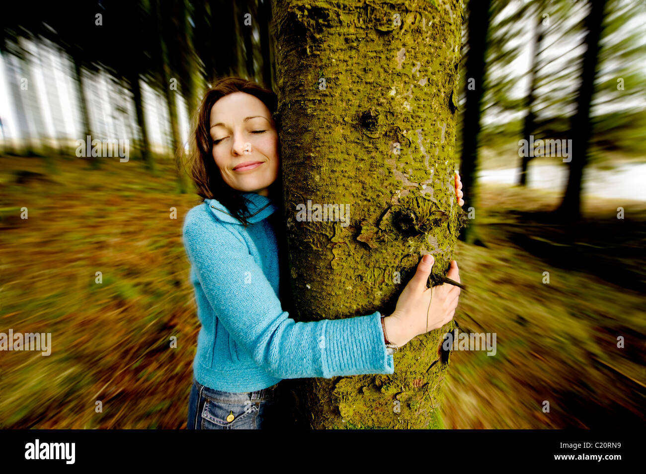 Tree hugging hippy hi-res stock photography and images - Alamy