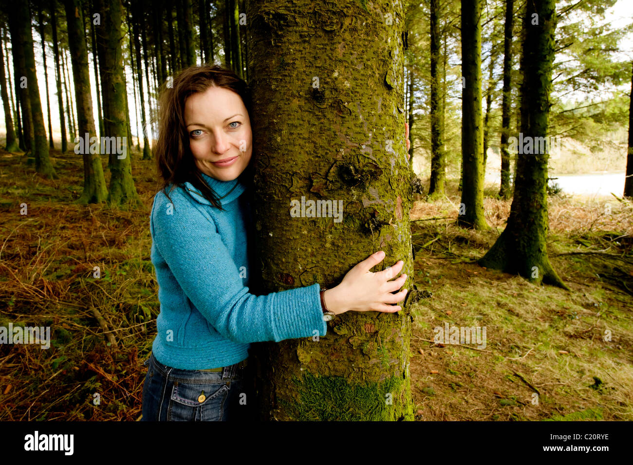 Tree hugging hippy hi-res stock photography and images - Alamy