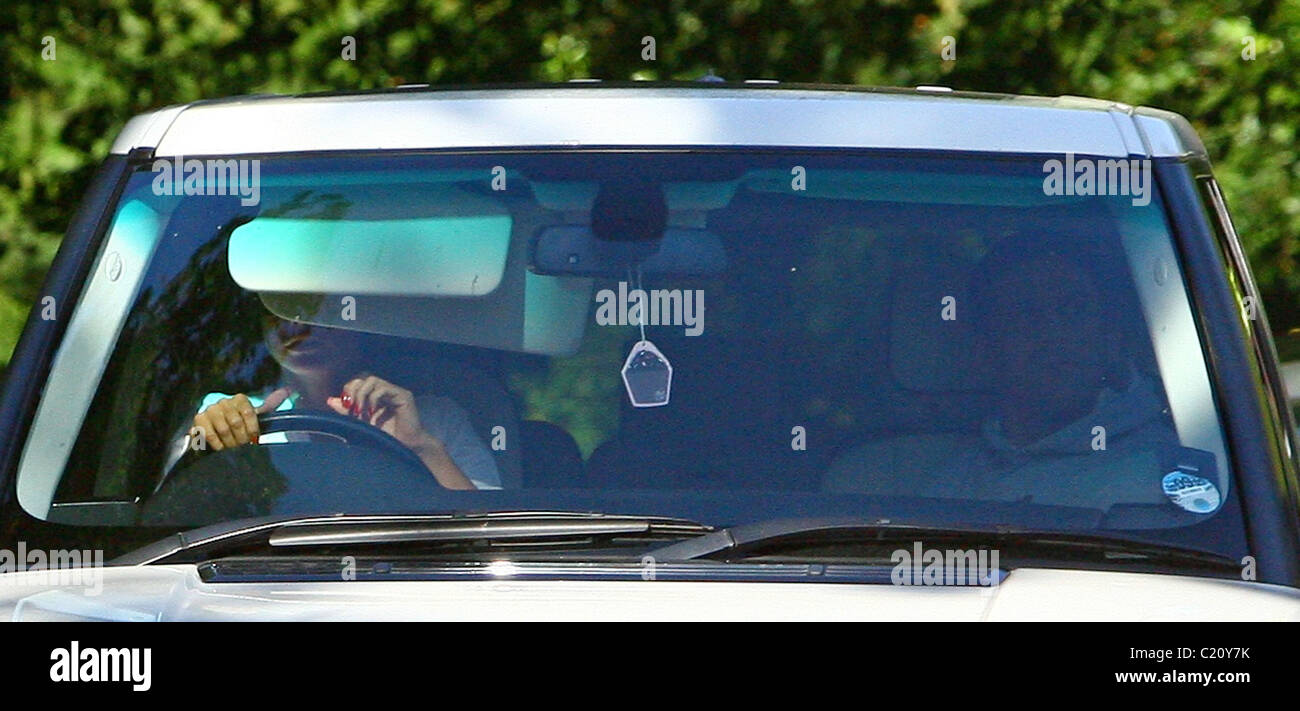 Katie Price aka Jordan and Alex Reid driving in Katie's Range Rover ...