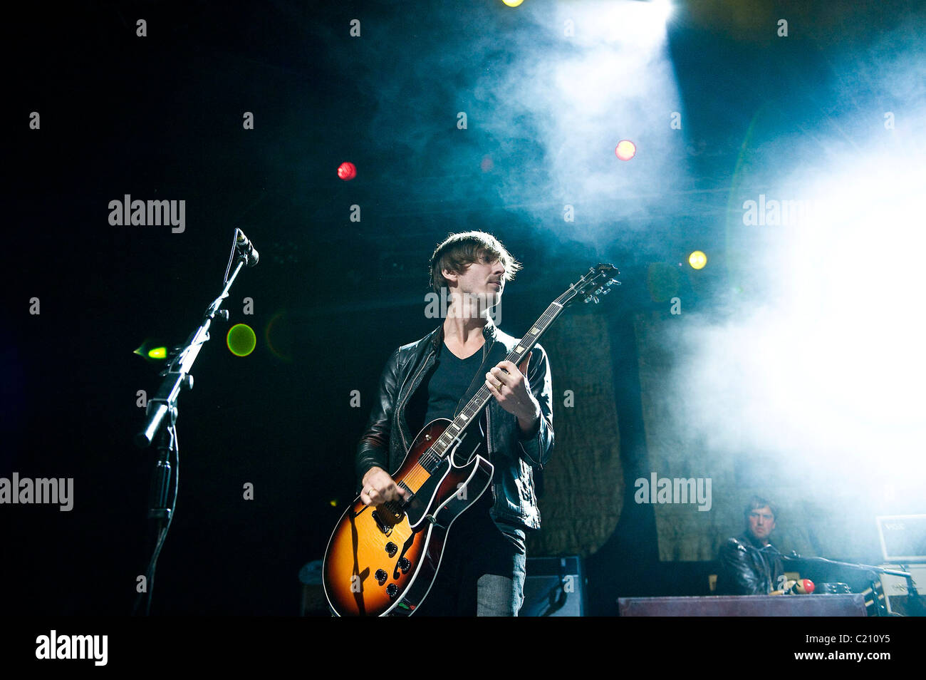Guitarist Cameron Muncey of the band Jet performs live at the HMV Forum ...