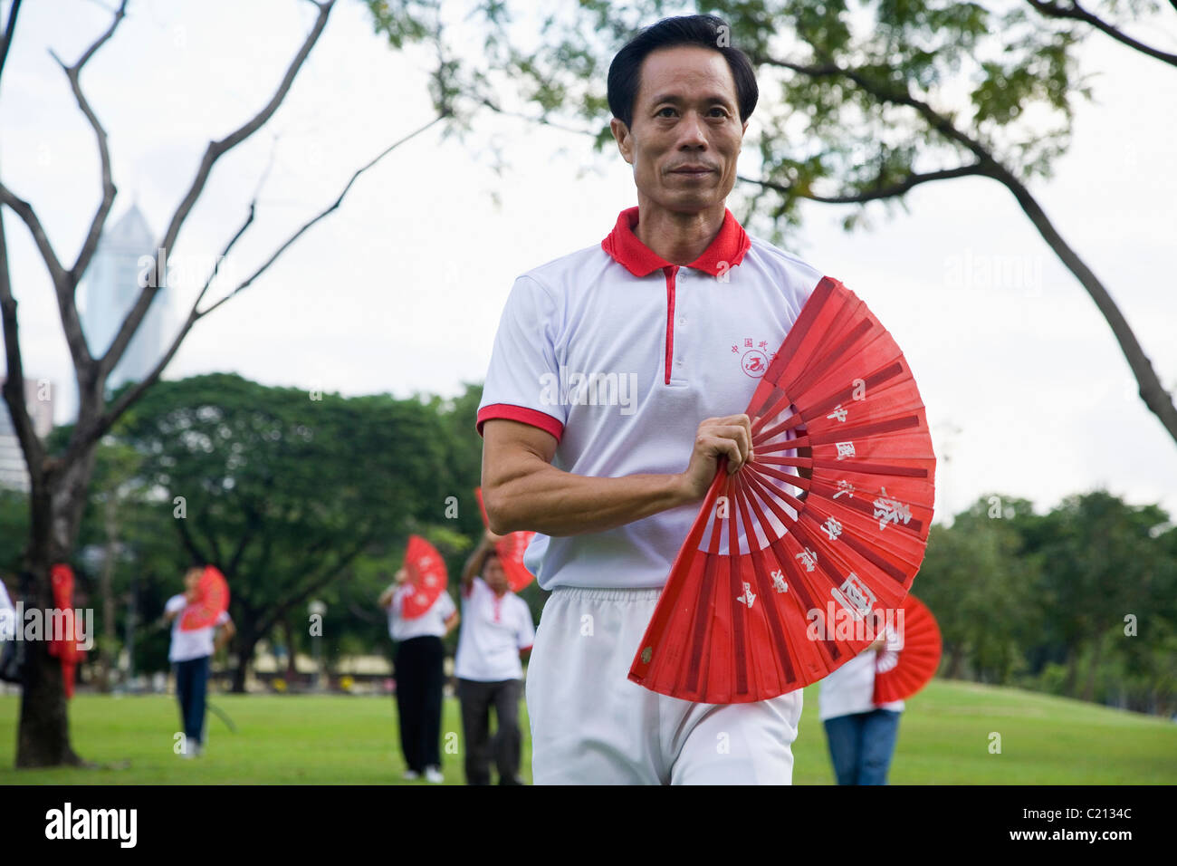 Man male tai chi exercise outdoors hi-res stock photography and images ...
