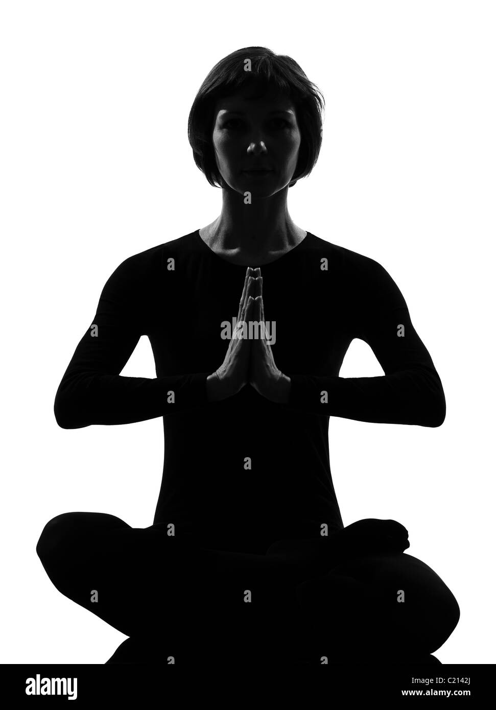 woman sukhasana pose meditation yoga posture position in silouhette on ...