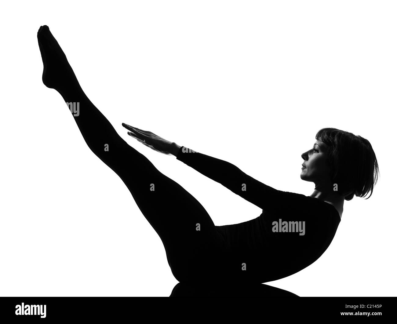 woman paripurna navasana boat pose yoga posture position in silouhette ...