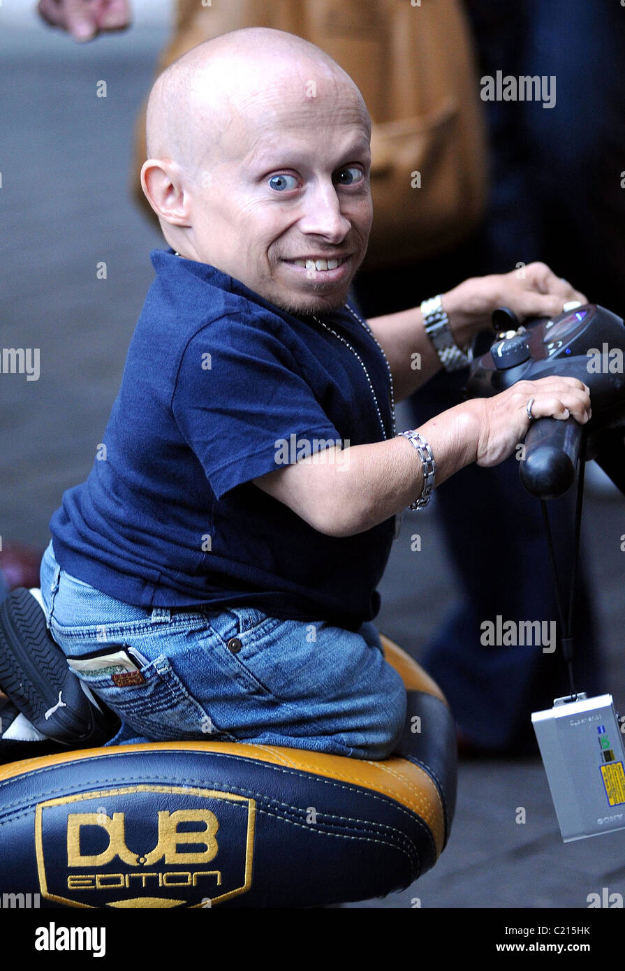 Verne Troyer rides on his pimped mobility scooter during the 2009 ...
