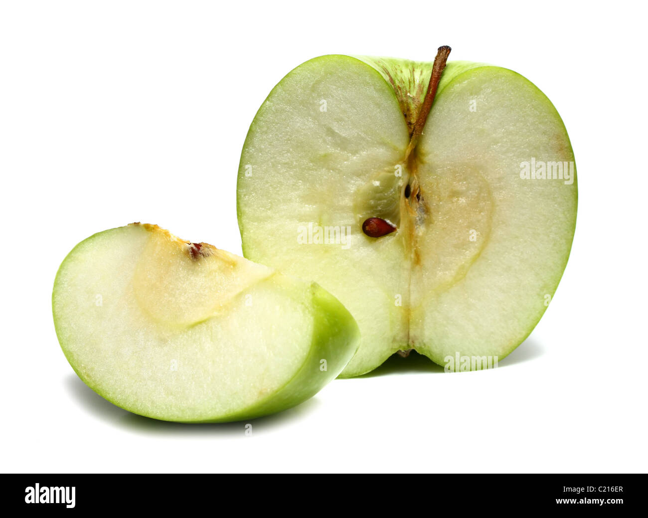 cut apple to pieces isolated on white background Stock Photo - Alamy