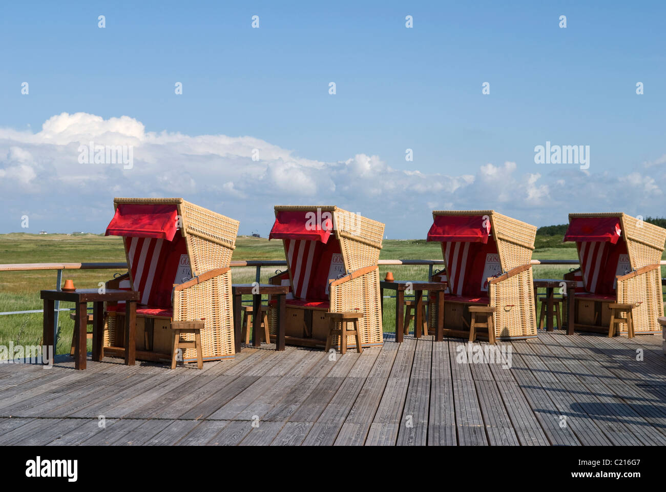 4 beach chairs Stock Photo - Alamy