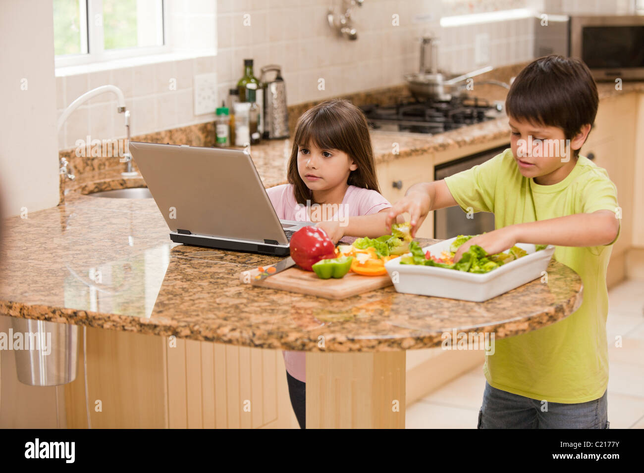 Children cooking in the kitchen Stock Photo - Alamy