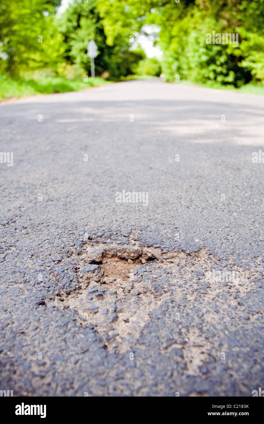 Road with holes hi-res stock photography and images - Alamy