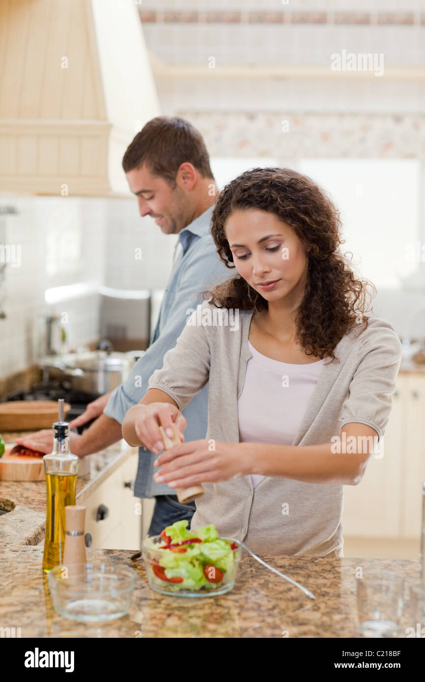 Handsome man cooking with his girlfriend Stock Photo - Alamy