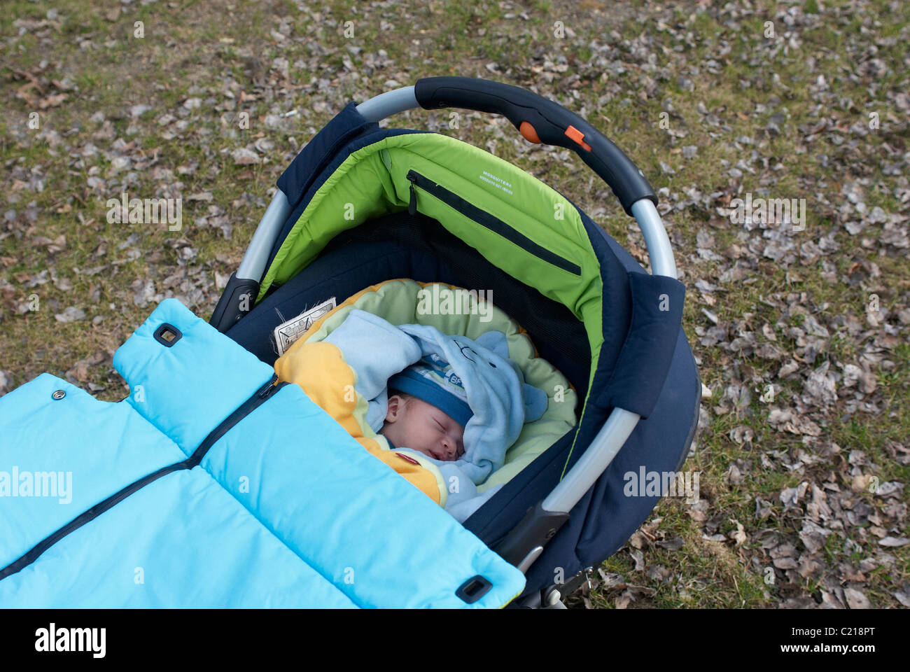 Child baby girl in buggy - pram - outside Stock Photo - Alamy