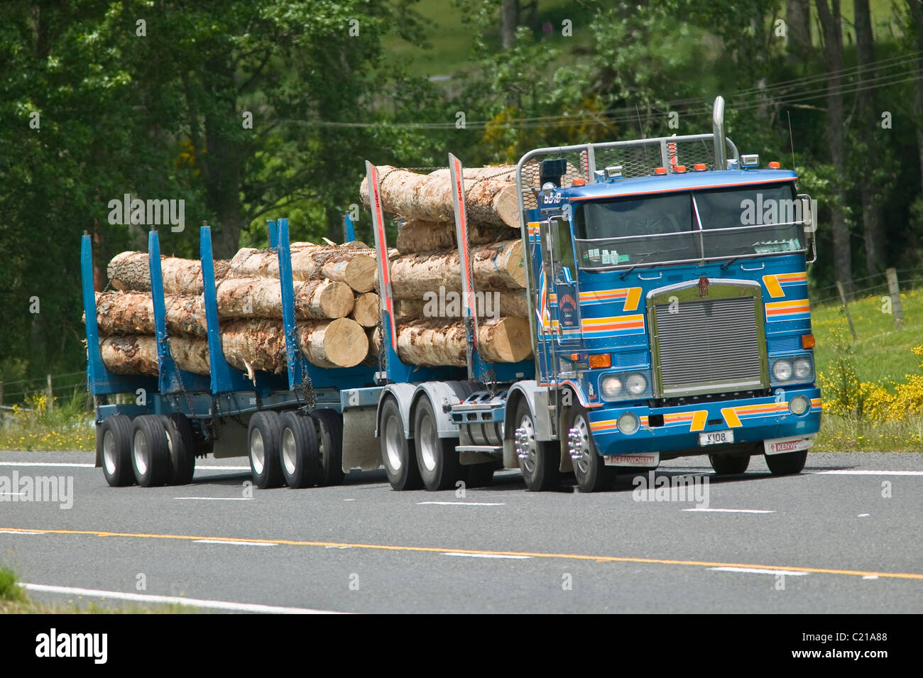 Truck with timber in New Zealand Stock Photo - Alamy