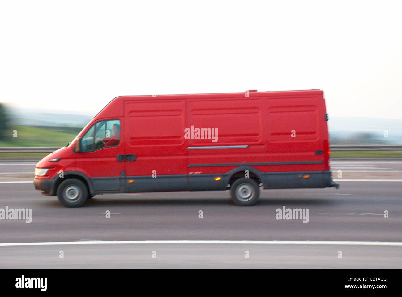 Big red van on the M62 motorway Stock Photo - Alamy