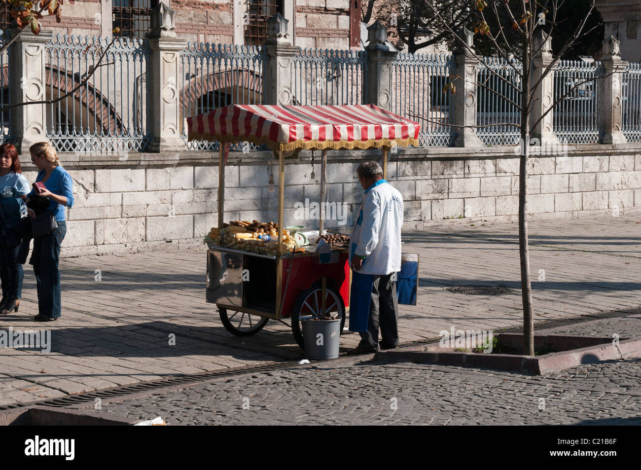 Man selling boiled corn with trolley in front of Hagia Sophia Stock ...