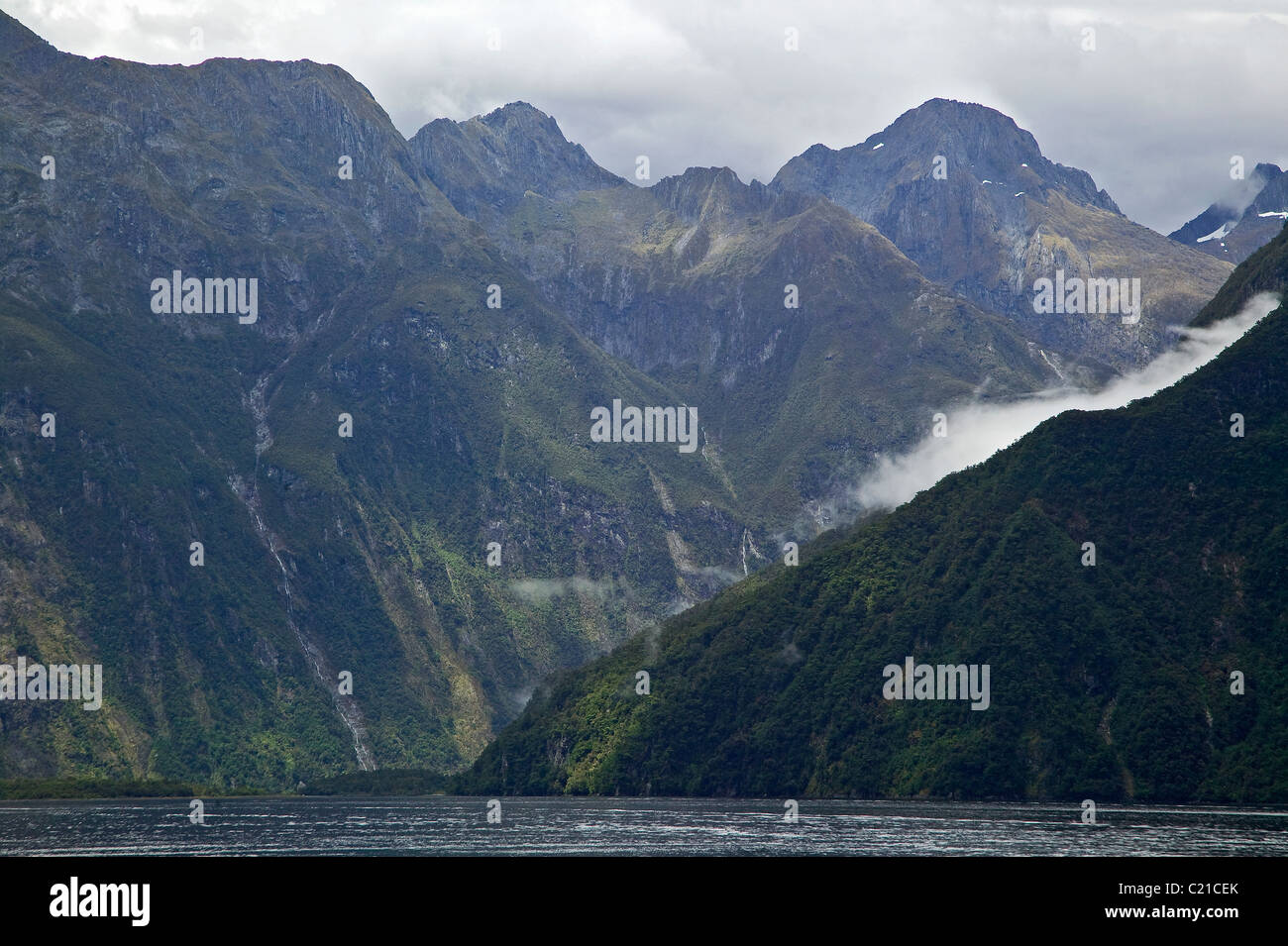 landscape with mountains in Milford Sound, New Zealand, South Island ...