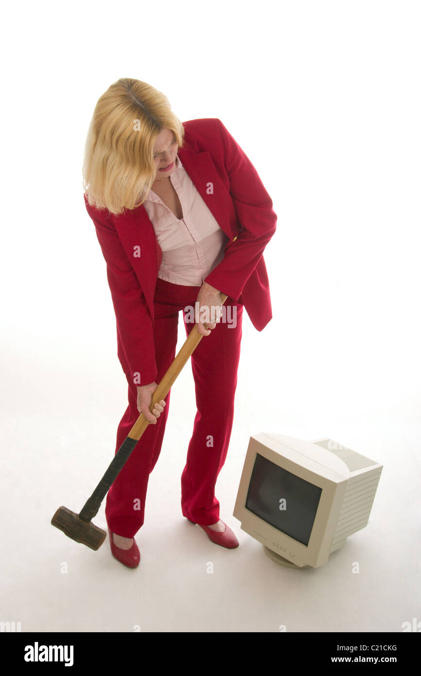 Woman hitting sledgehammer hi-res stock photography and images - Alamy