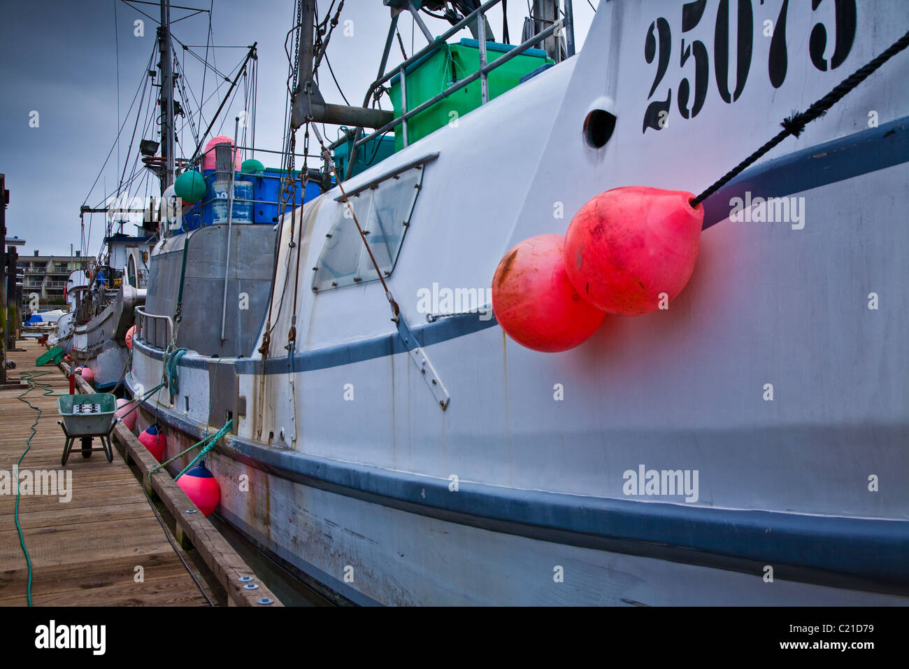 Hull of a fishing boat moored at a dock, Vancouver, British Columbia ...