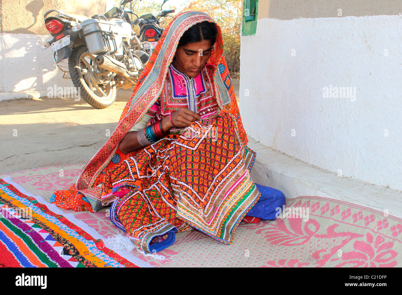 A rural woman doing embroidery work Stock Photo - Alamy