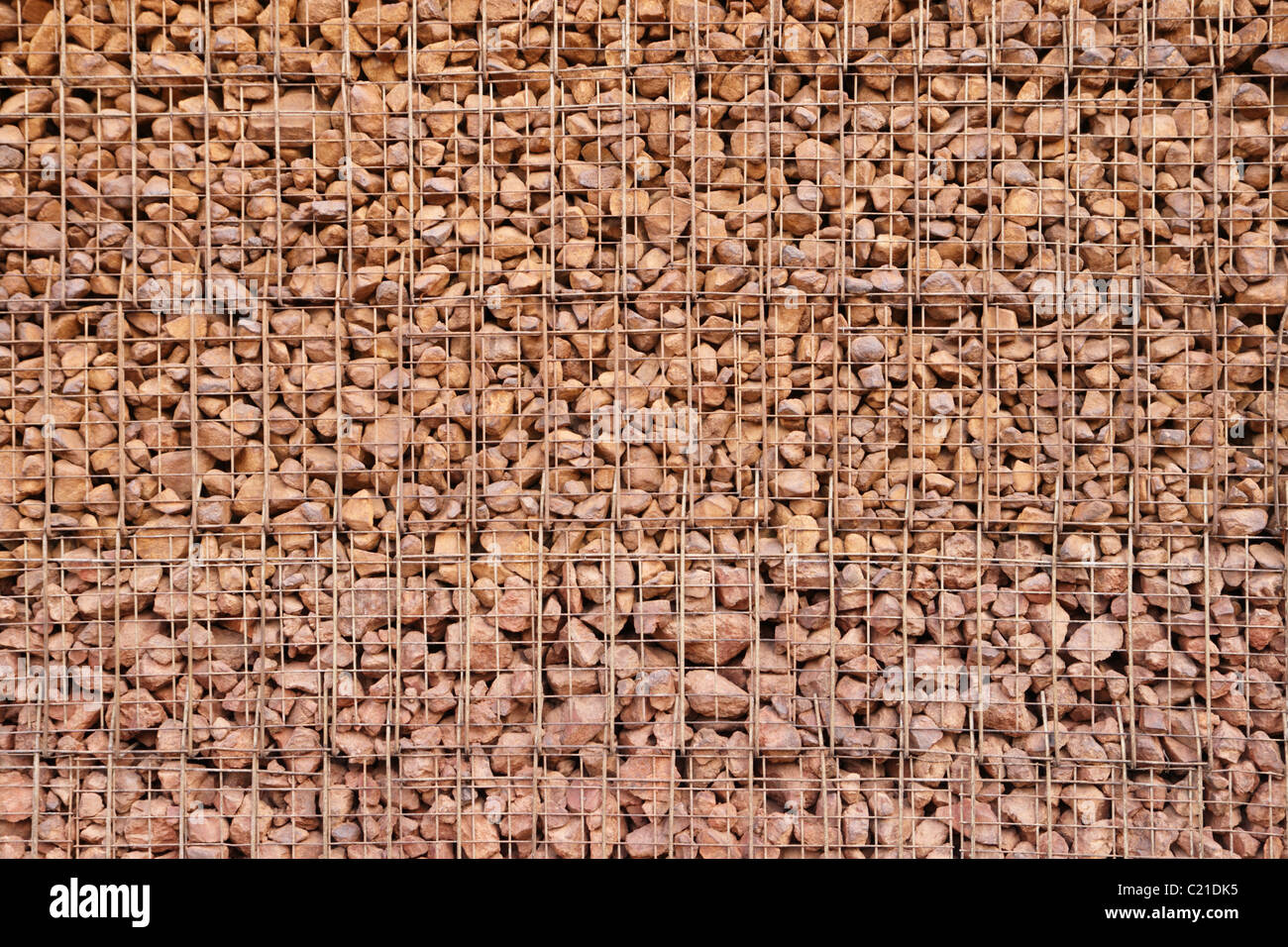 wire mesh gabion and loose rock retaining wall background Stock Photo ...