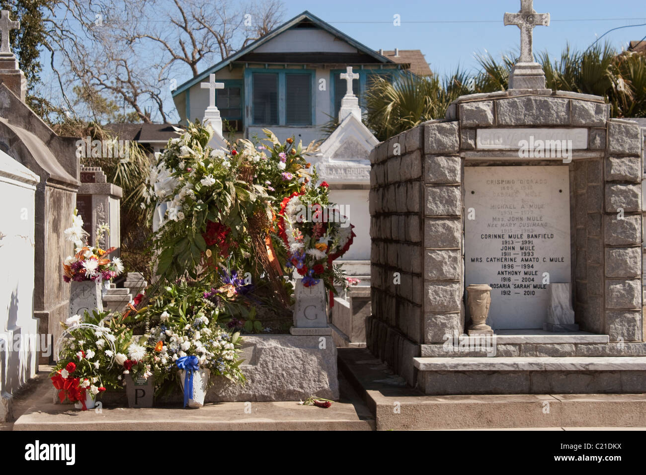 Flowers adorning a recent burial in a New Orleans cemetery Stock Photo ...