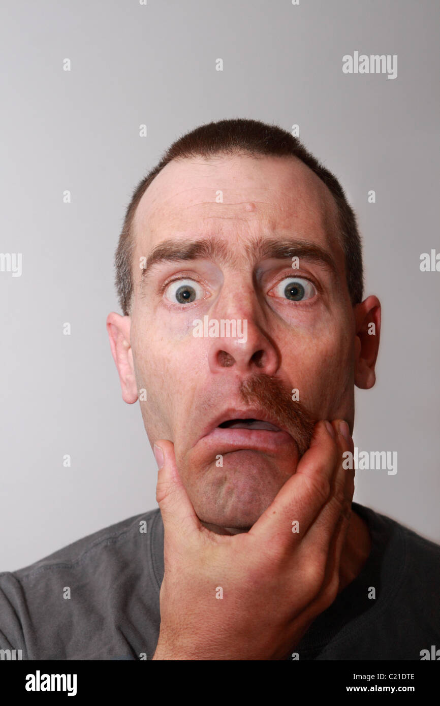 surprised man with half a mustache and the other half gone Stock Photo ...