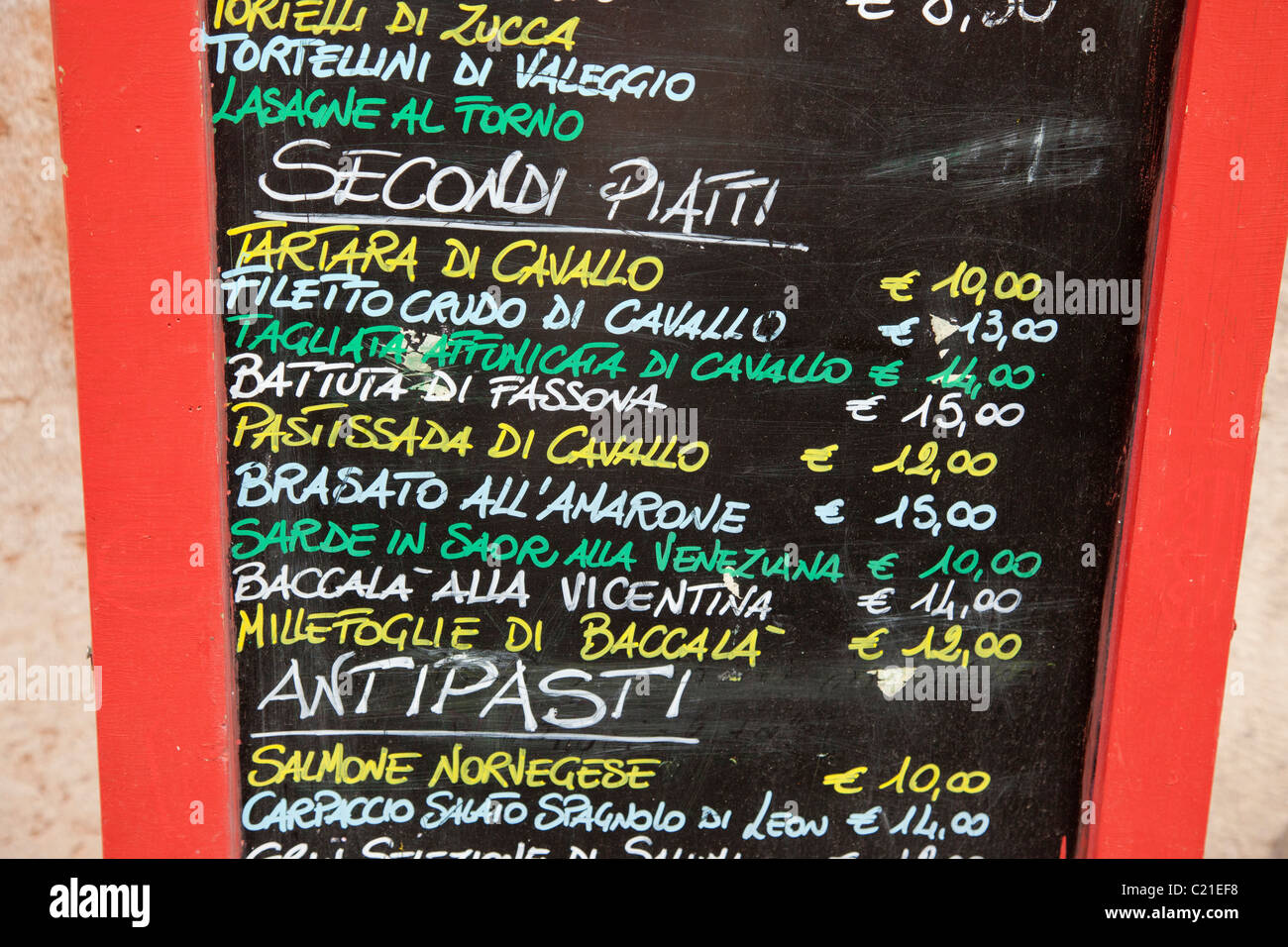 Menu displayed outside restaurant in Verona Italy Stock Photo - Alamy