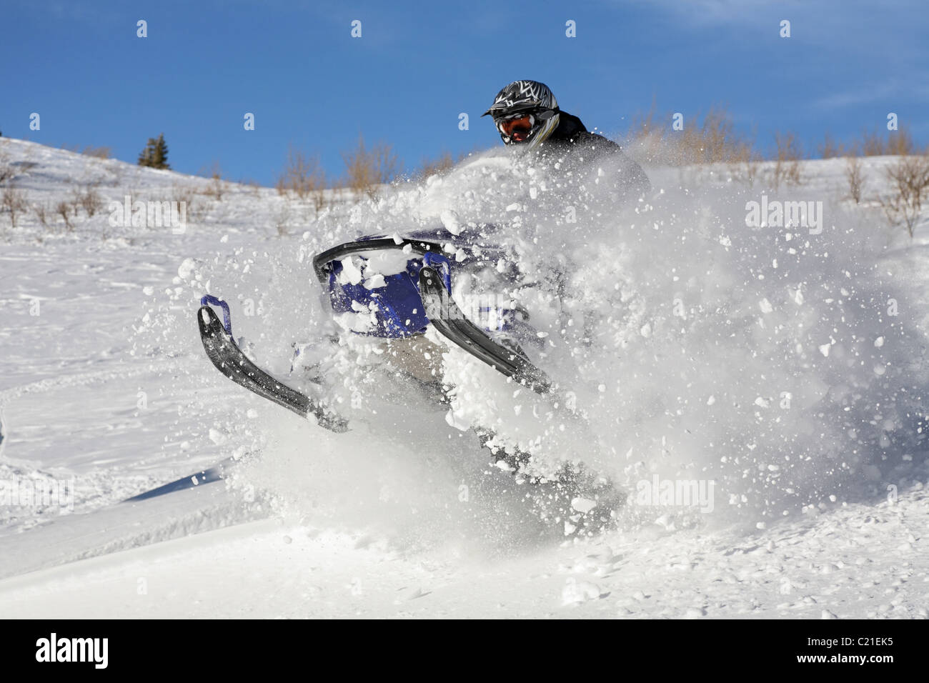 Man riding snowmobile hi-res stock photography and images - Alamy