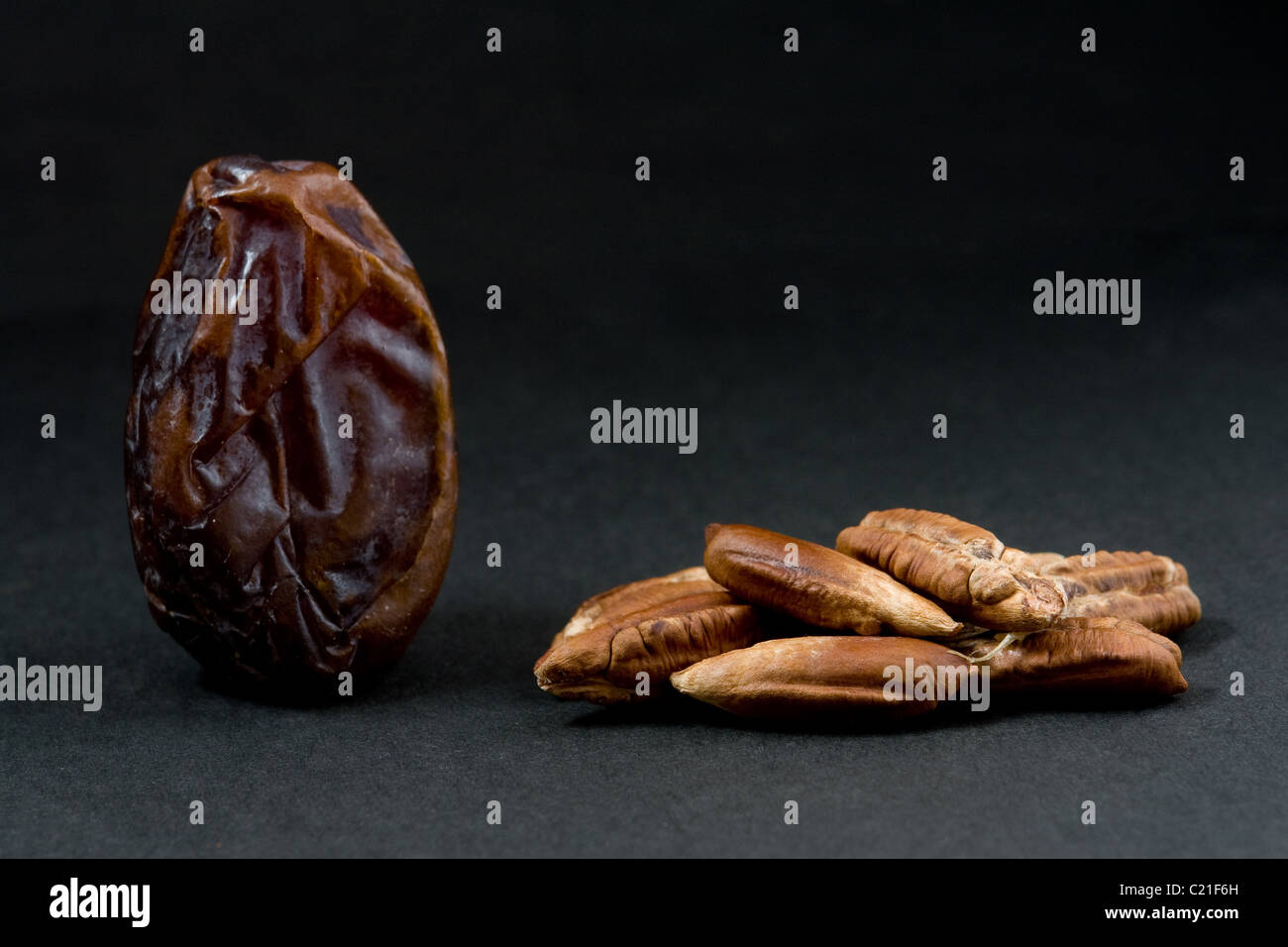 Single Date with several date seeds Stock Photo - Alamy
