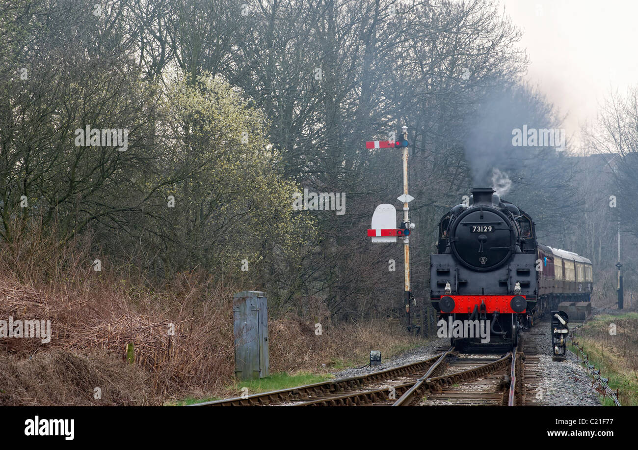 Standard Class 5 steam locomotive approaches Ramsbottom Station in ...