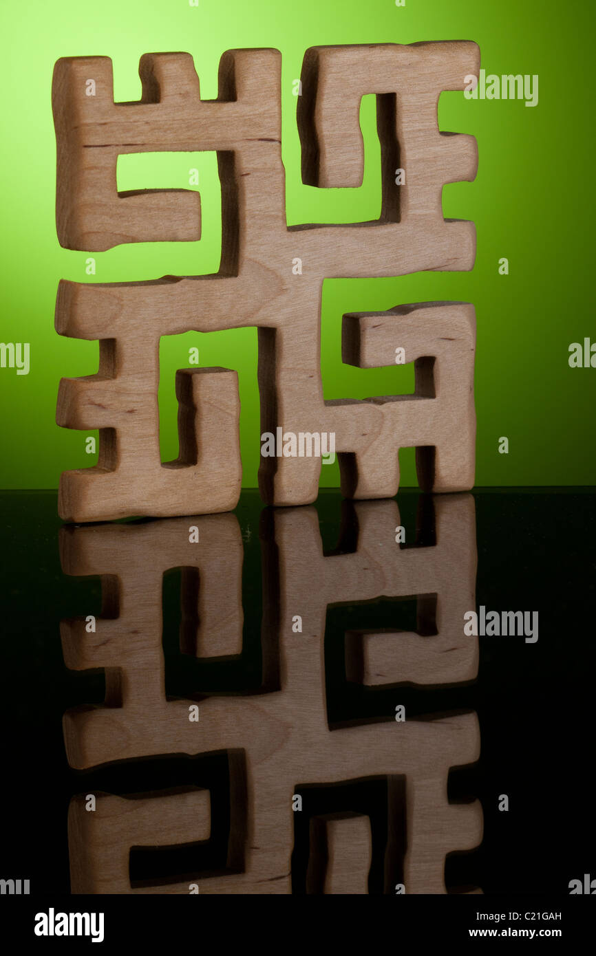 Latvian folklore sign with reflection Stock Photo - Alamy