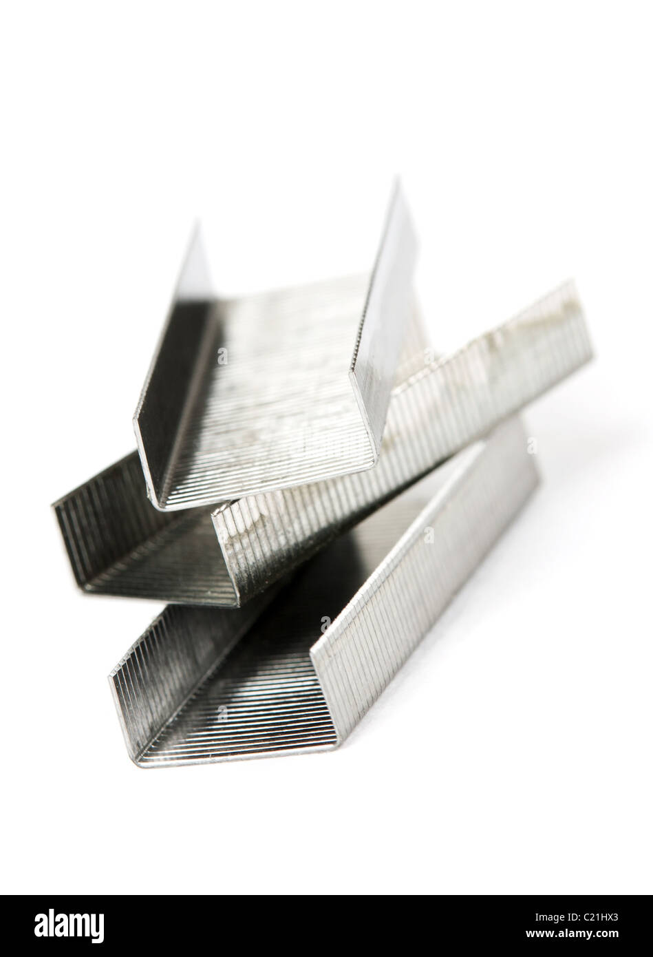 Metal staples isolated on a white background Stock Photo - Alamy