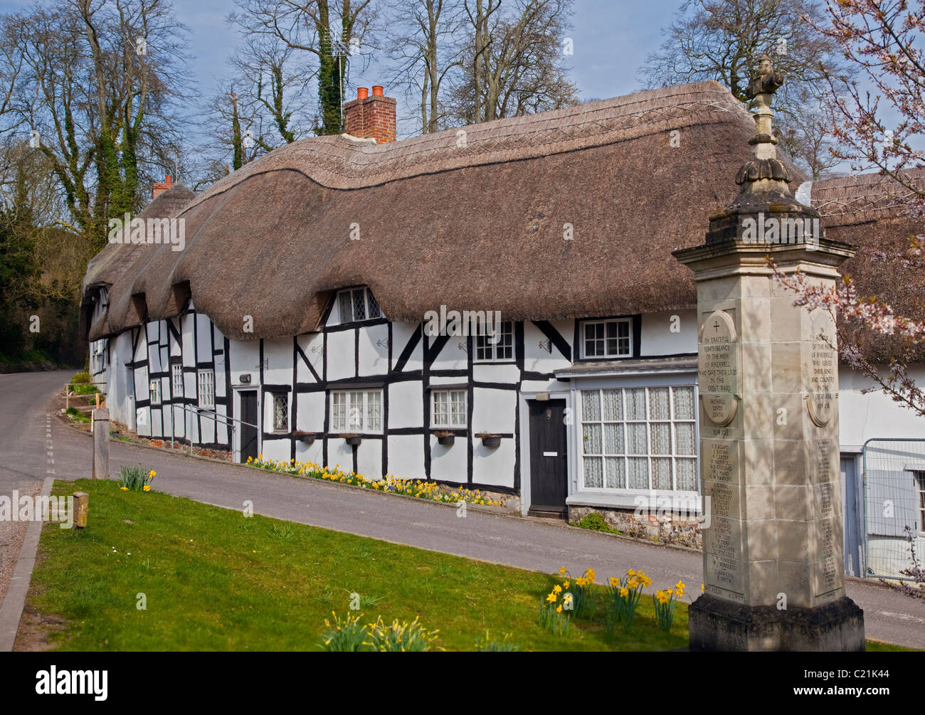 Cottages and War Memorial in Wherwell, Hampshire, England Stock Photo ...