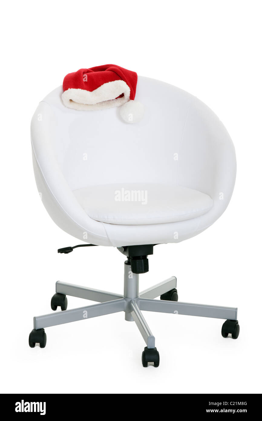 light chair and Santa's hat on a white background Stock Photo - Alamy
