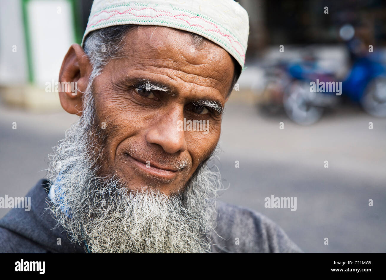Portrait of a Burmese muslim man in the Thai border town of Mae Sot ...