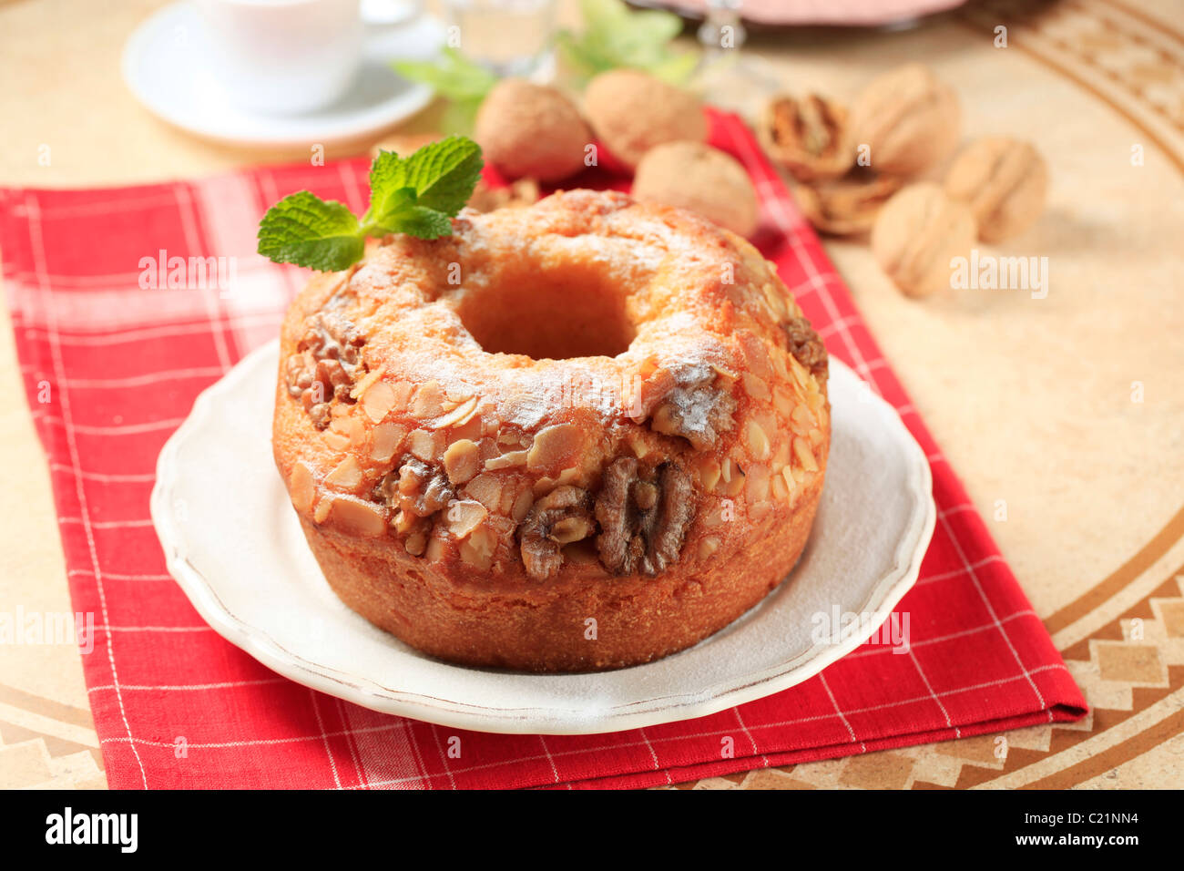 Sponge cake with walnuts - still life Stock Photo - Alamy