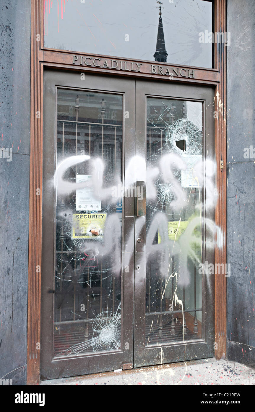 Smashed windows March for the alternative no cuts Stock Photo - Alamy