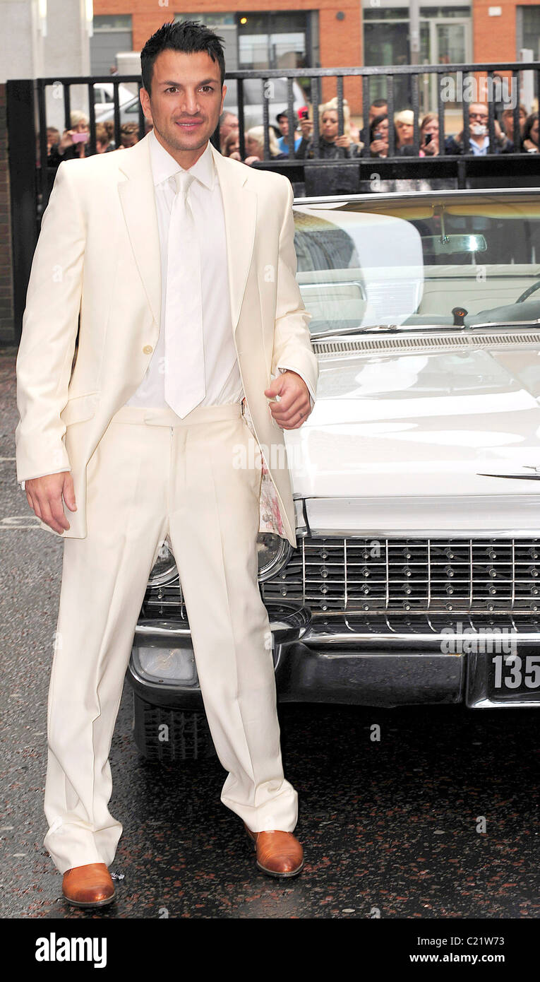 Peter Andre attends a photocall with a white Cadillac to launch 'Peter ...