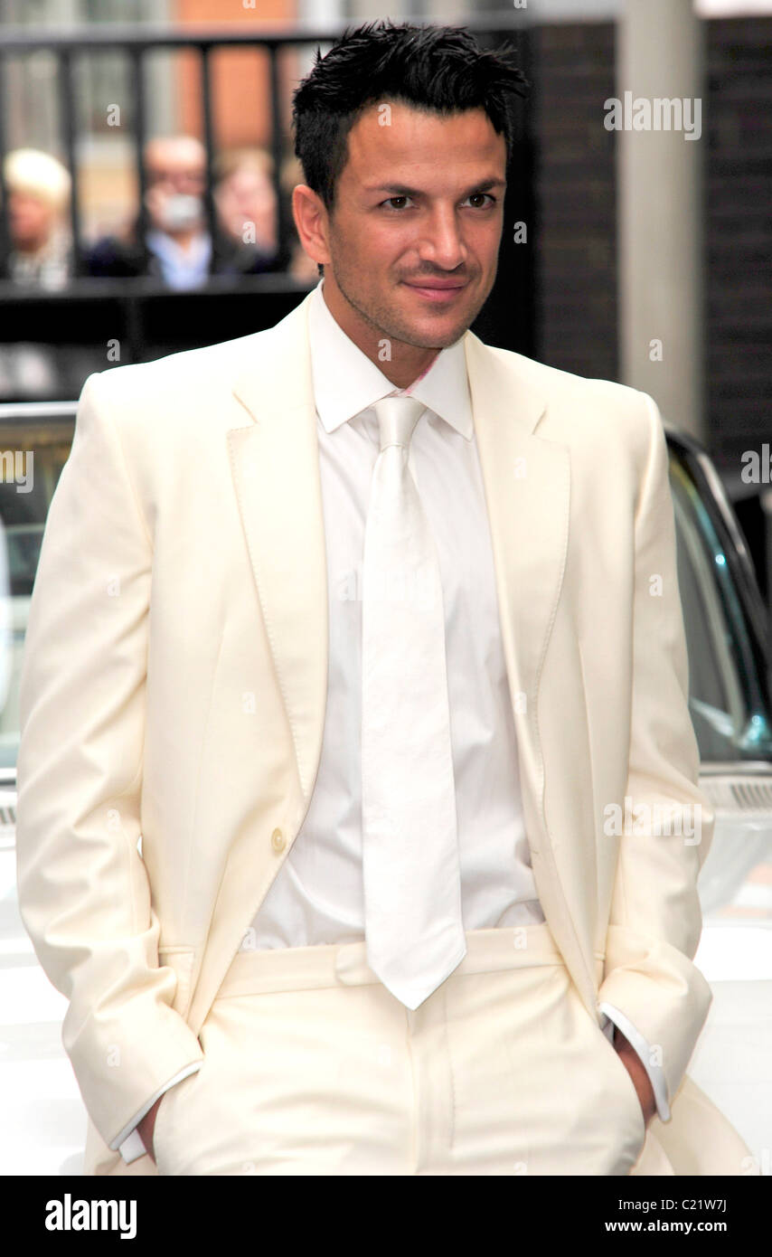 Peter Andre attends a photocall with a white Cadillac to launch 'Peter ...