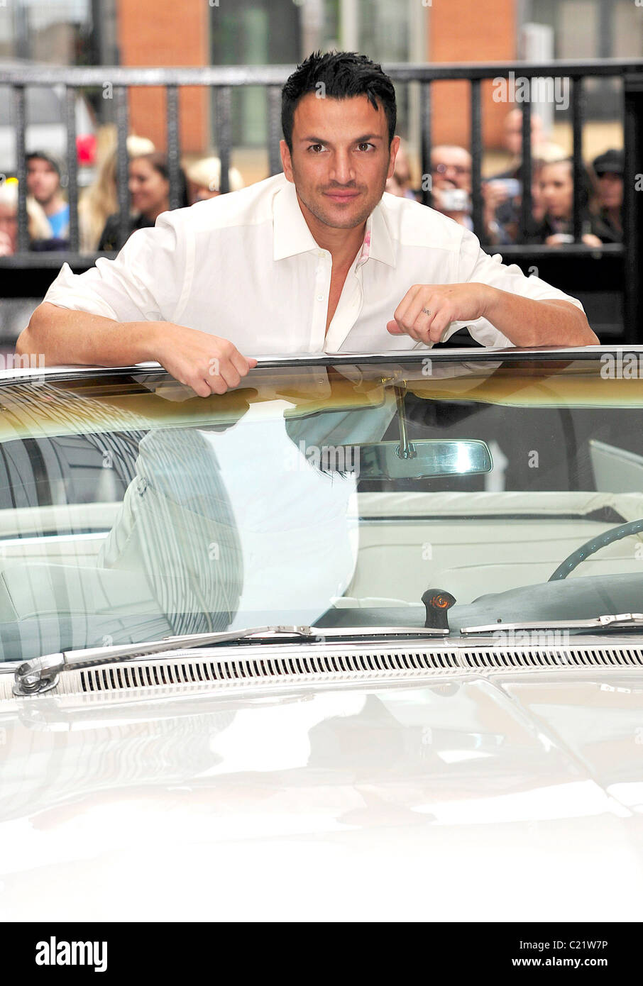 Peter Andre attends a photocall with a white Cadillac to launch 'Peter ...