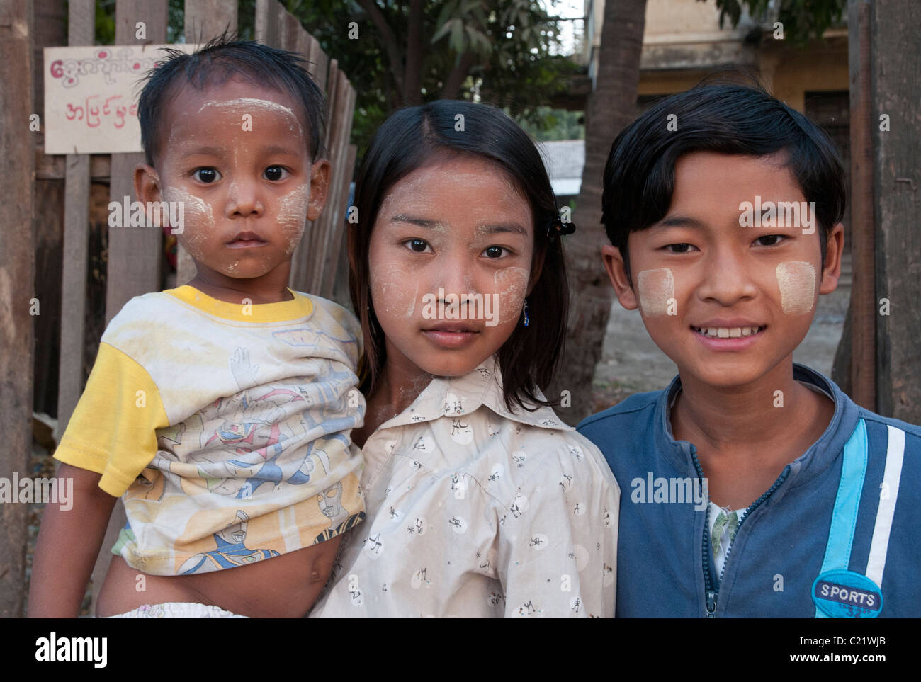 Portrait of 3 children wearing Tanaka. Mandalay. Myanmar Stock Photo ...