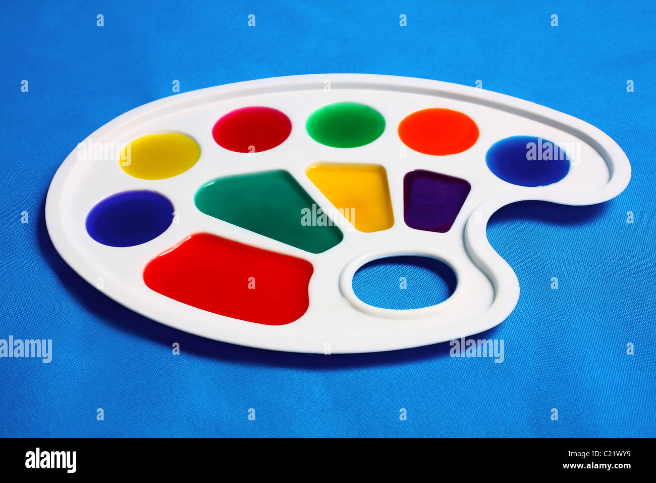 palette for drawing isolated on blue background Stock Photo - Alamy
