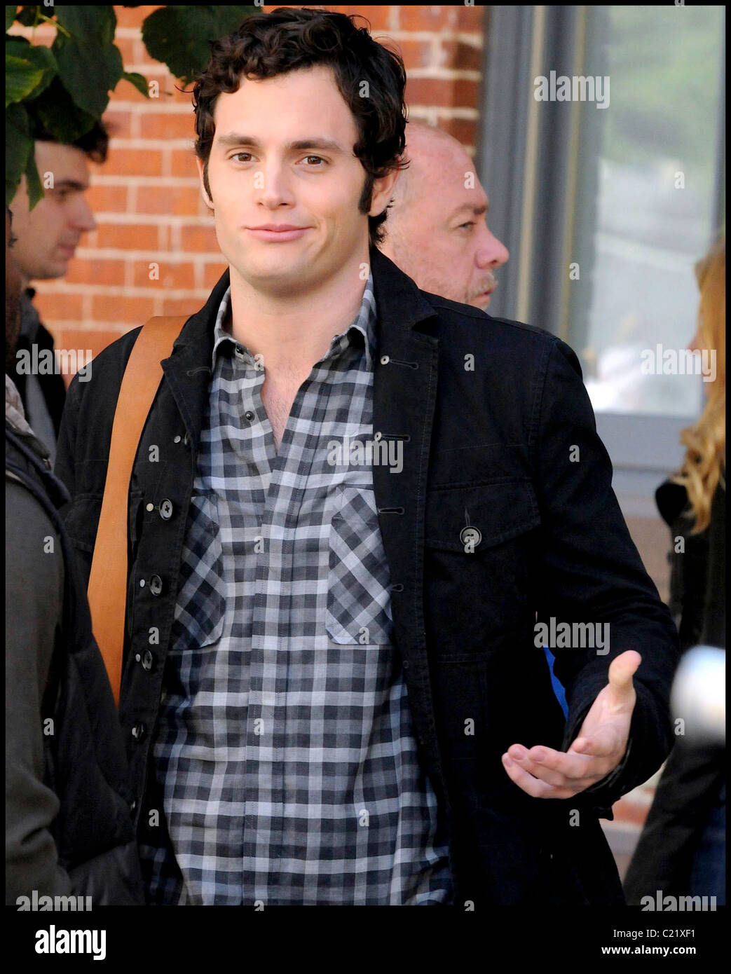 Penn Badgley filming on the set of 'Gossip Girl' in Manhattan New York ...