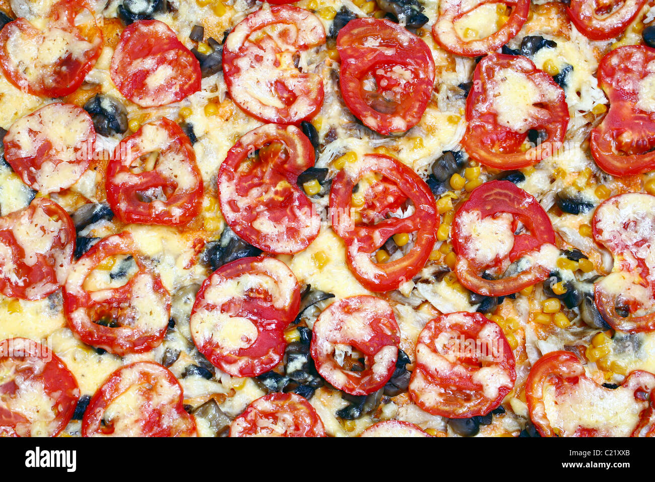 large fresh delicious pizza background Stock Photo - Alamy