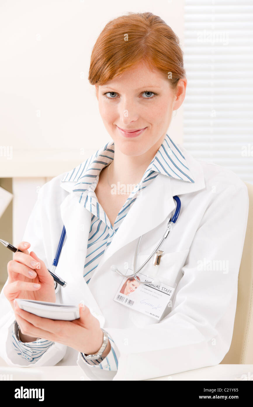 Doctor office - portrait of female physician write prescription Stock ...