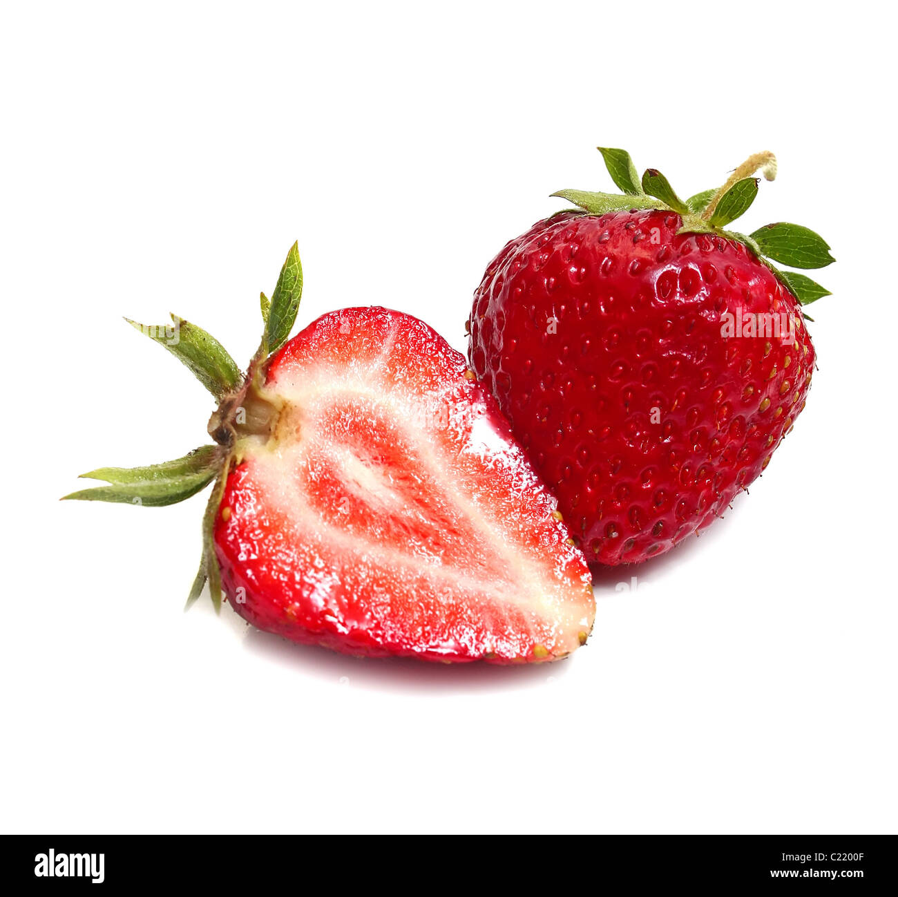 strawberry slice isolated on white background Stock Photo - Alamy